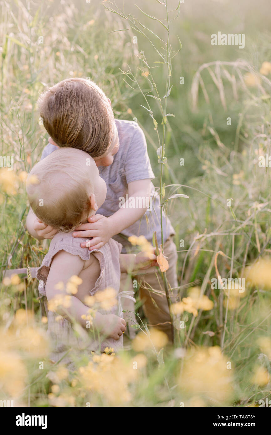 Brother sister hug hi-res stock photography and images - Alamy