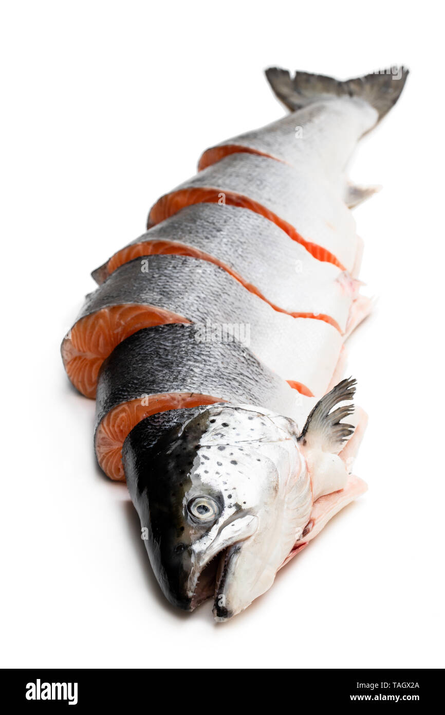 Fresh whole raw salmon cut into slices isolated on white Stock Photo ...