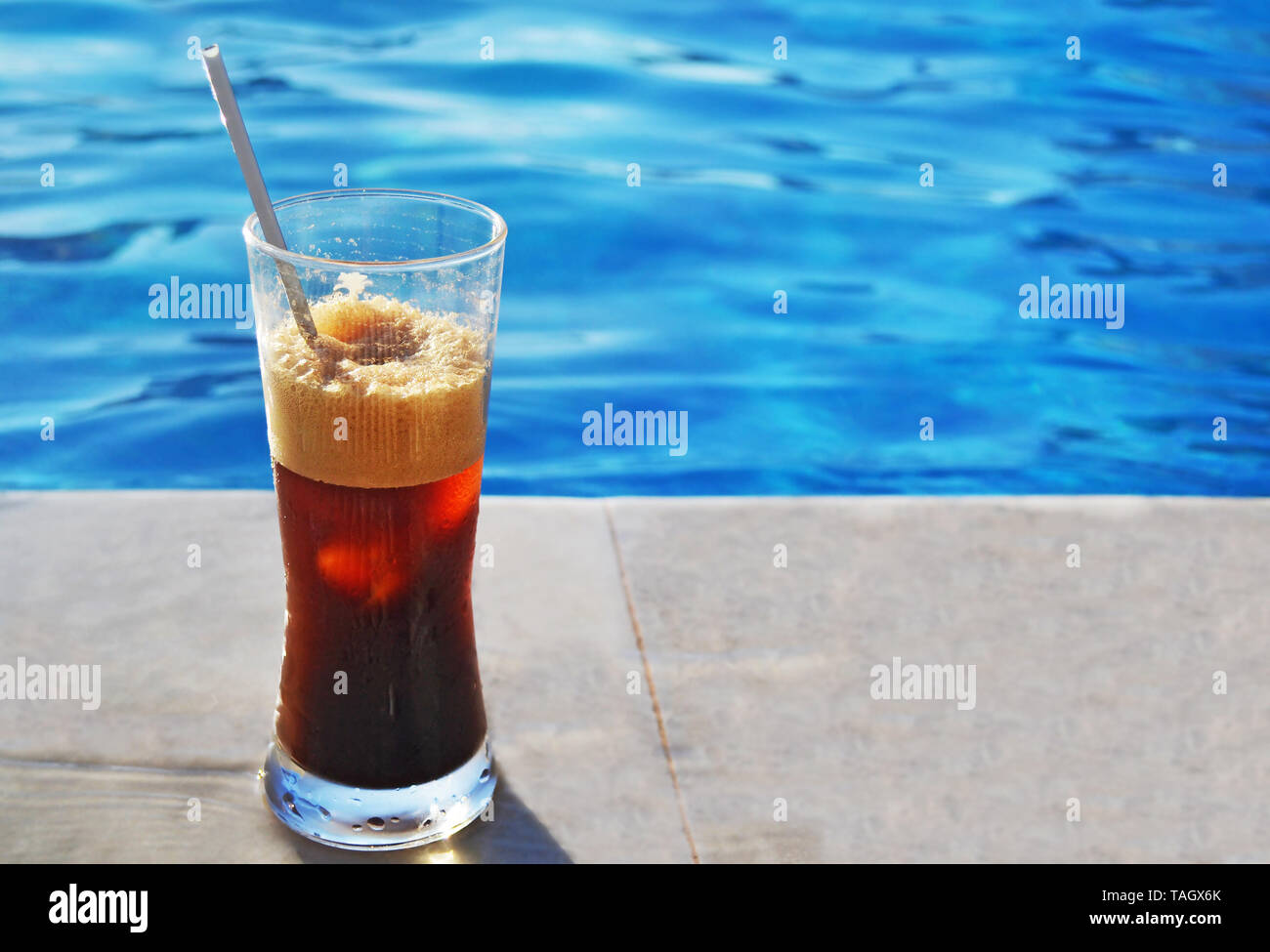 freddo espresso coffee in front of a pool - cold coffee - summer ...