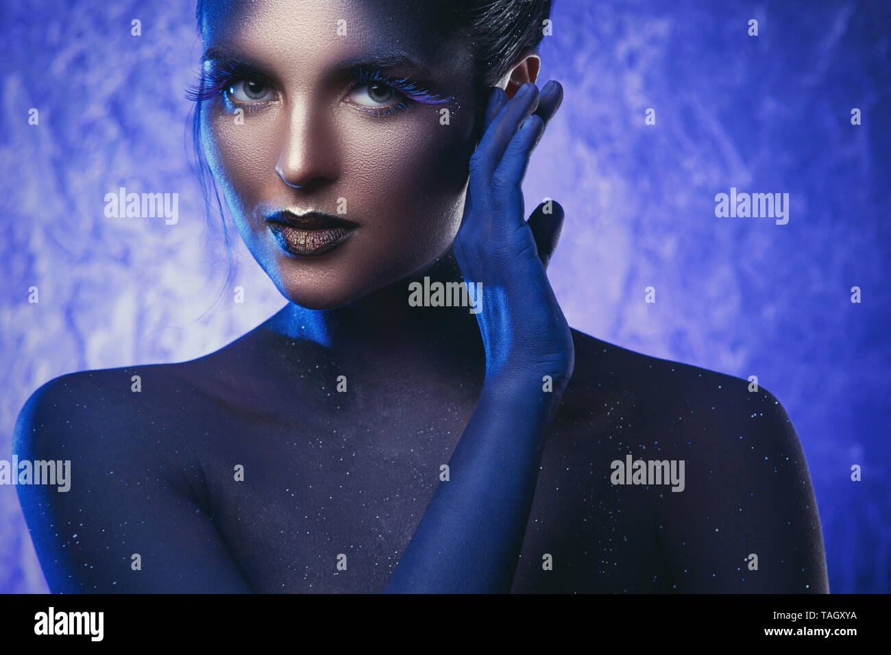 Beautiful woman blue hair body paint hi-res stock photography and ...