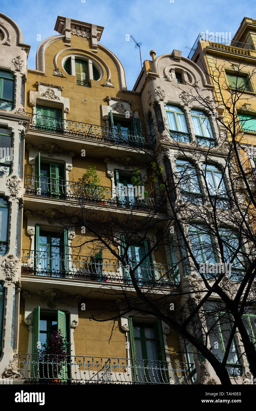 Barcelona, Spain. February 10, 2019. Old building facade and balconies ...