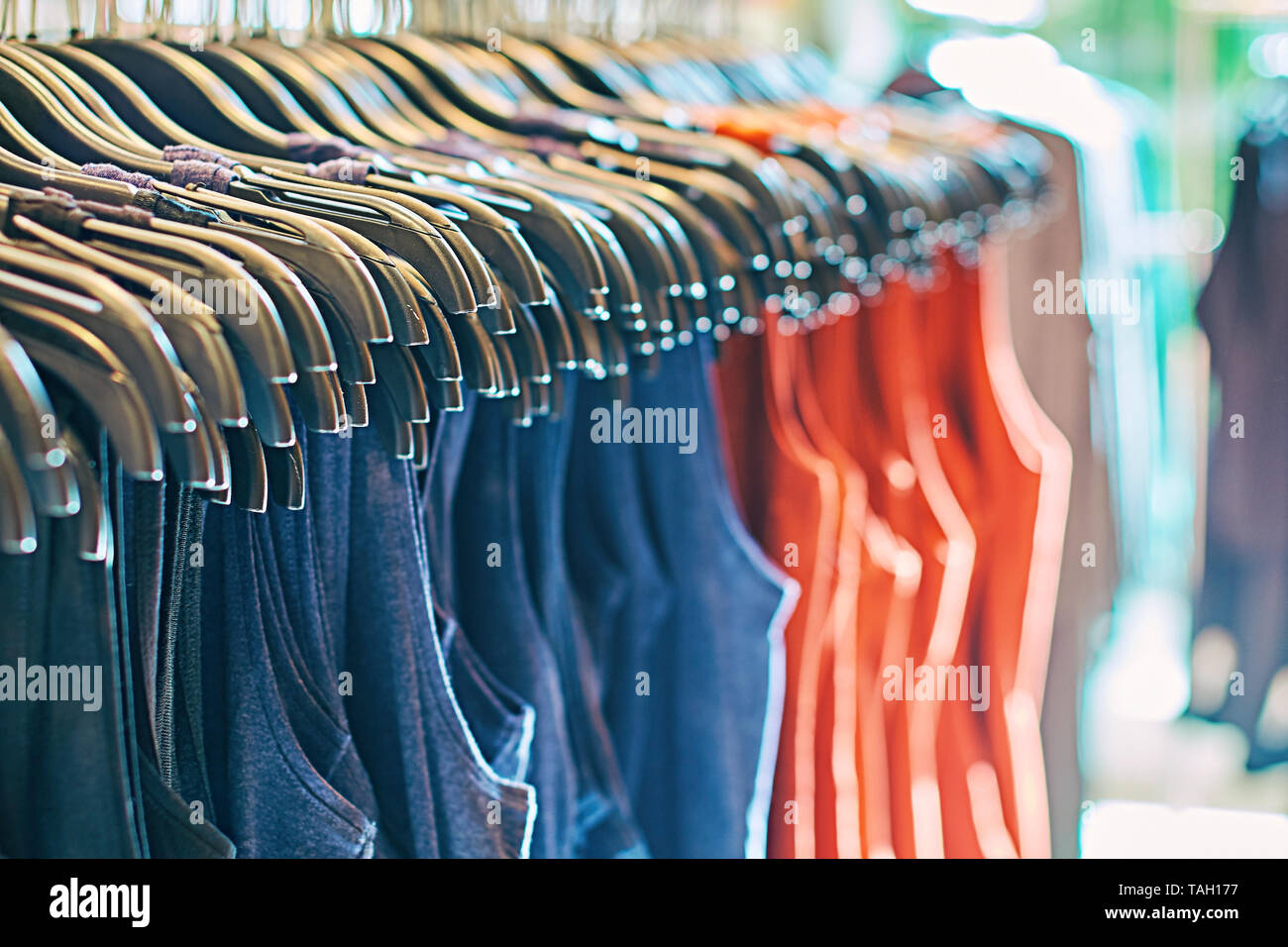 Fashion trend concept. Interior of clothes store with different women ...