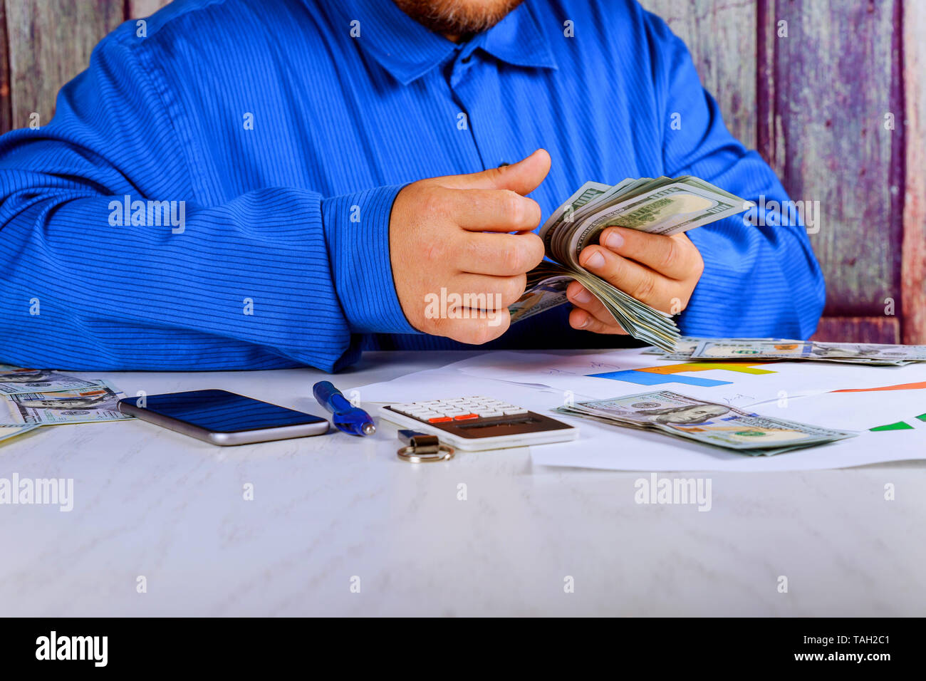 Businessman counting U.S. dollar bills accounting office working Stock ...