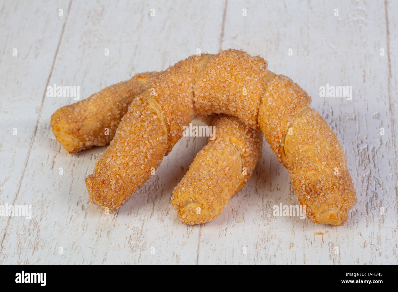 Tasty sugar coated pastry roll Stock Photo - Alamy