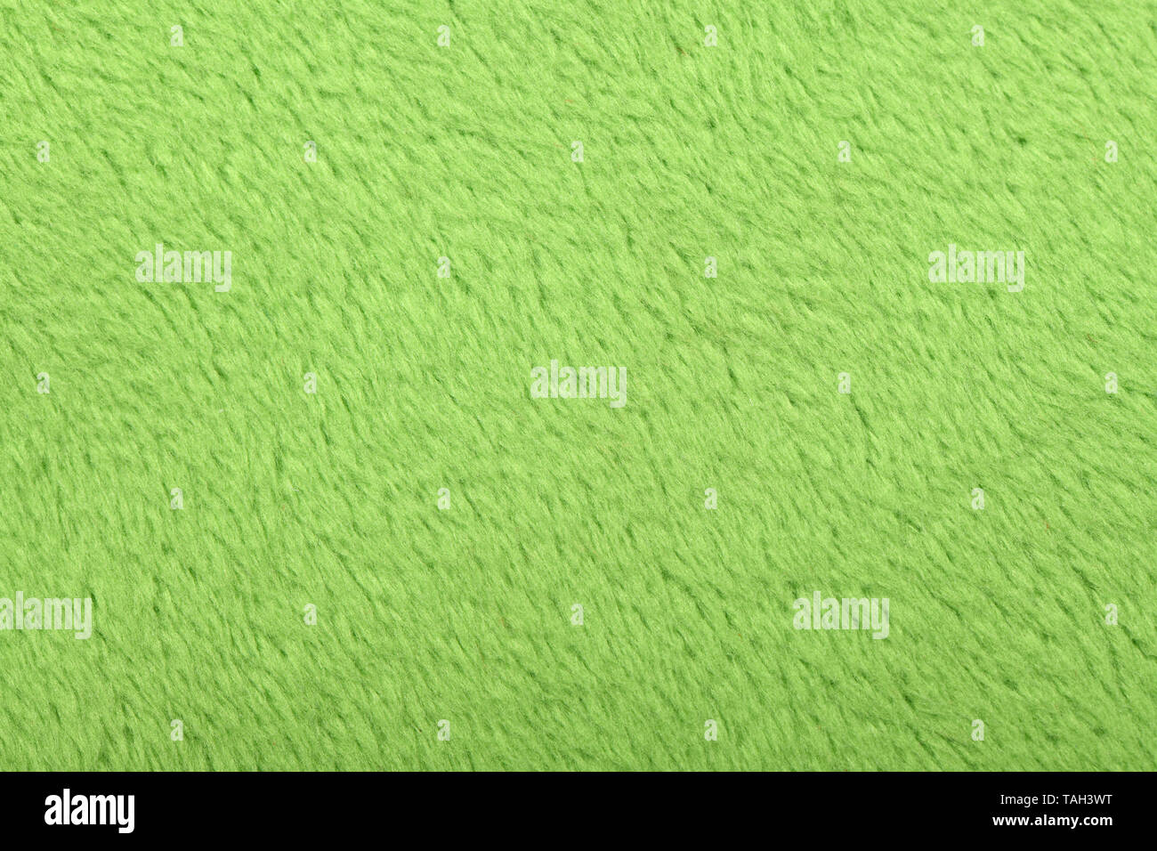 Texture of light green wool textile material closeup. Green abstract ...