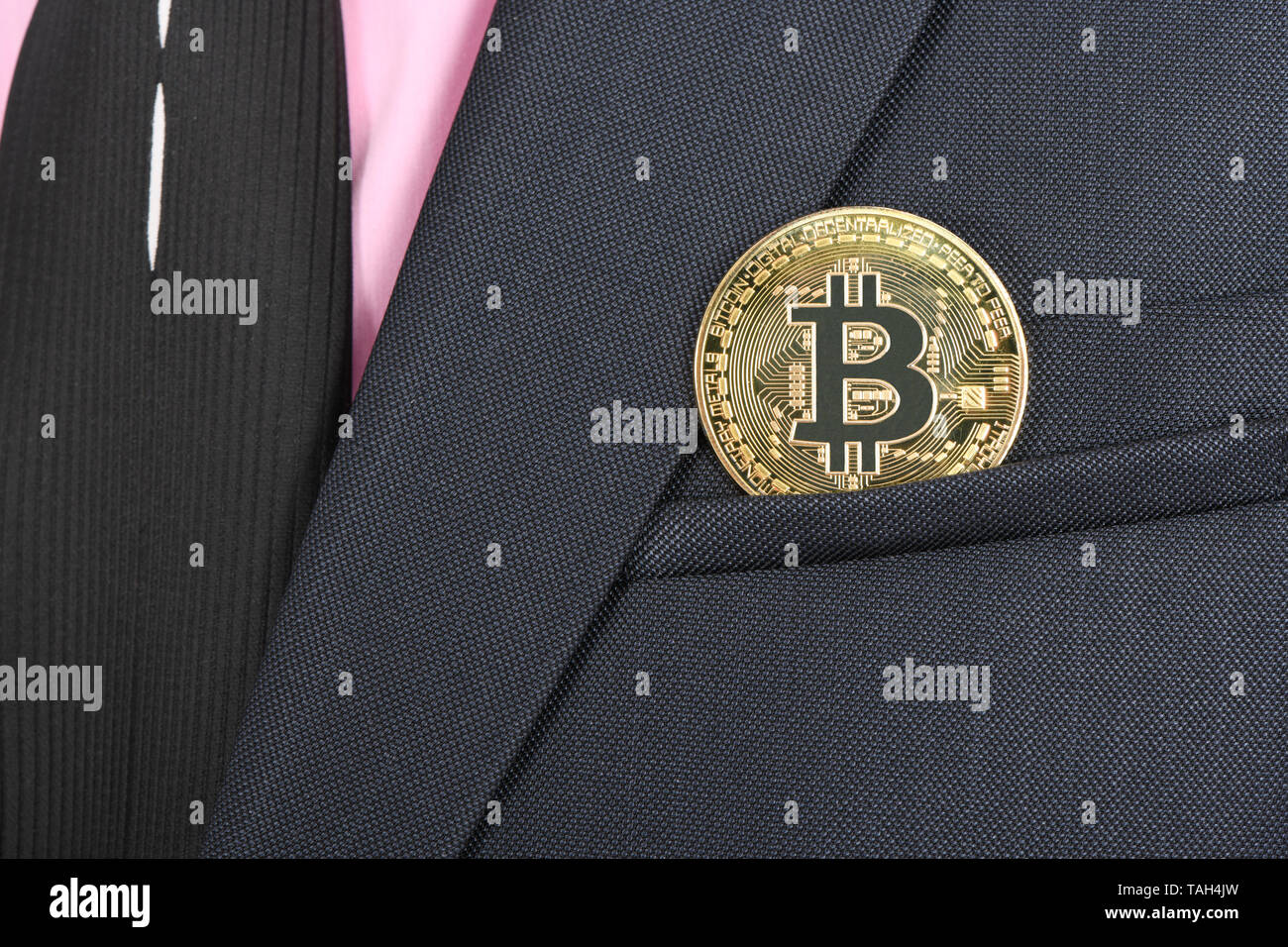 Bitcoin in jacket pocket. High resolution photo. Full depth of field ...