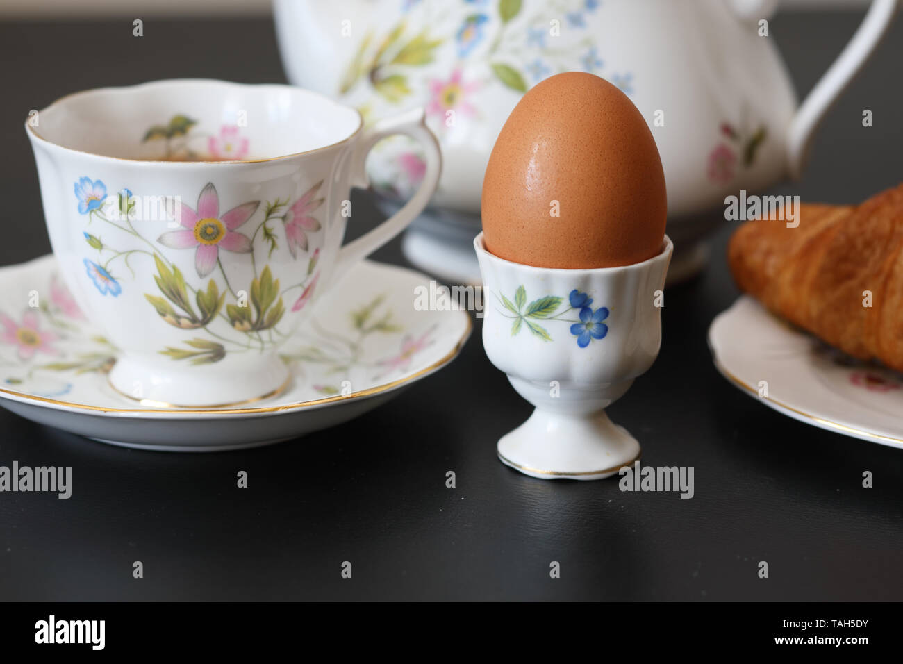 China breakfast set on a black background with an egg Stock Photo - Alamy