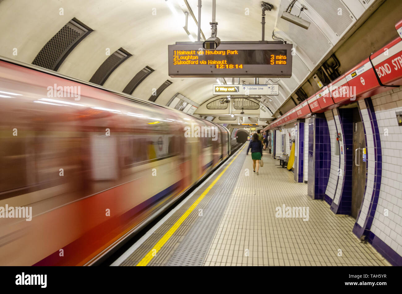 A train departs form bond Street London Underground Railway Station on ...