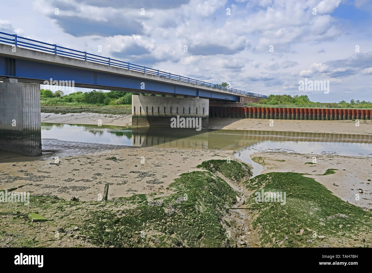 A road Bridge over the Creek at Milton Stock Photo - Alamy
