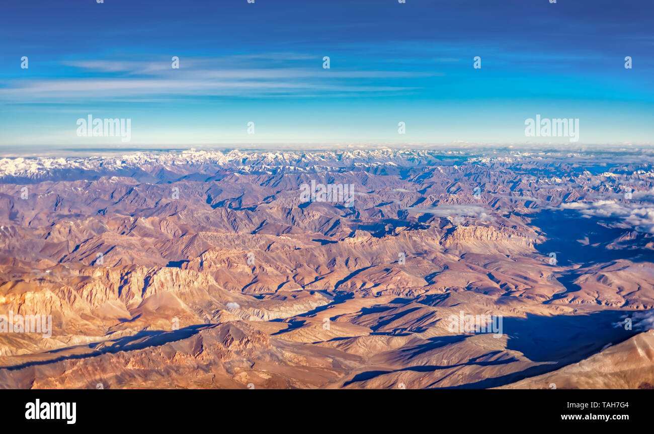 An aerial view of the barren landscape of the Zanskar range of inner ...