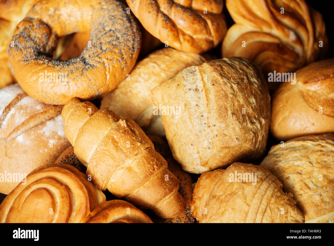 Assortment of baked bread. Food background Stock Photo - Alamy