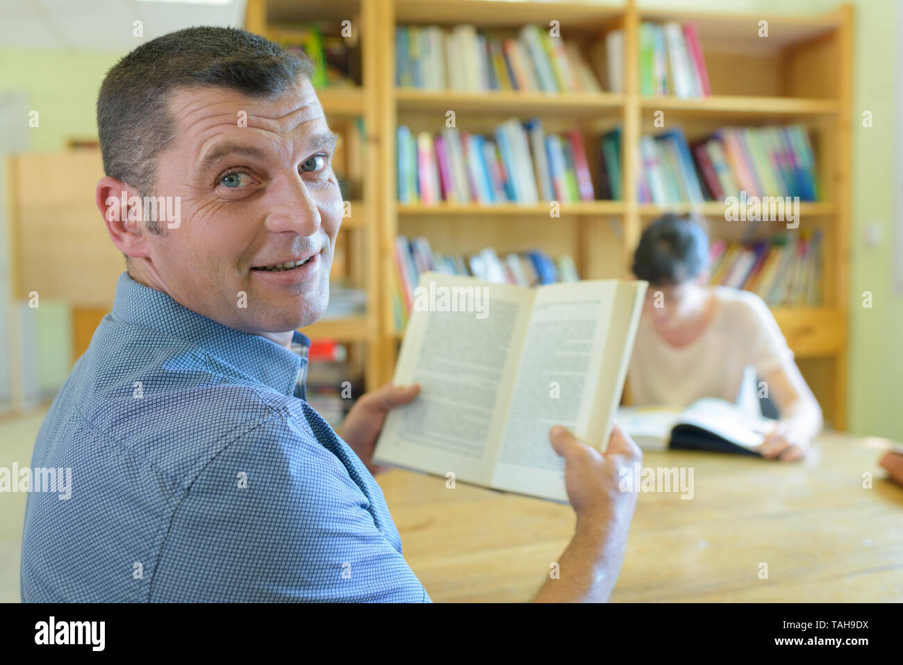 Choosing textbook hi-res stock photography and images - Alamy