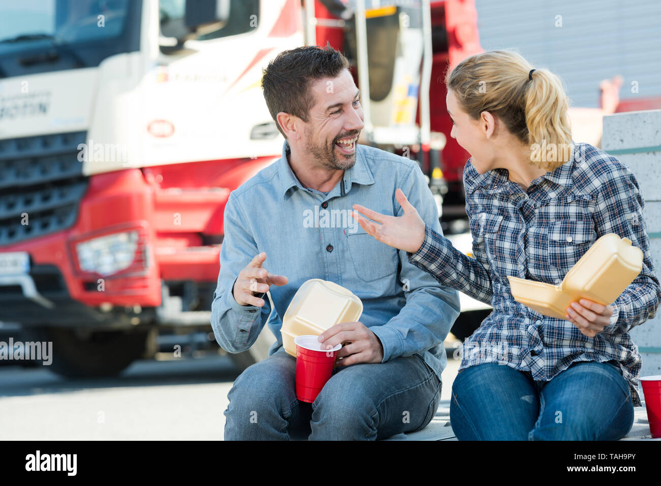 warehouse workers having lunch break Stock Photo - Alamy
