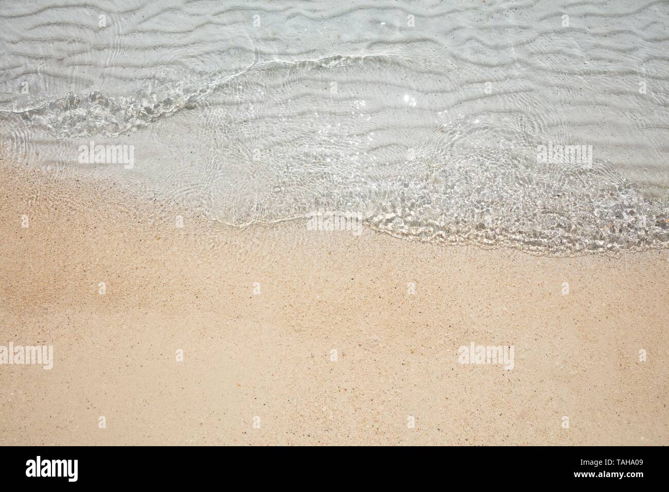 An Overhead View Of Shiny Crystal Sea Water On Sand At Beach Stock ...