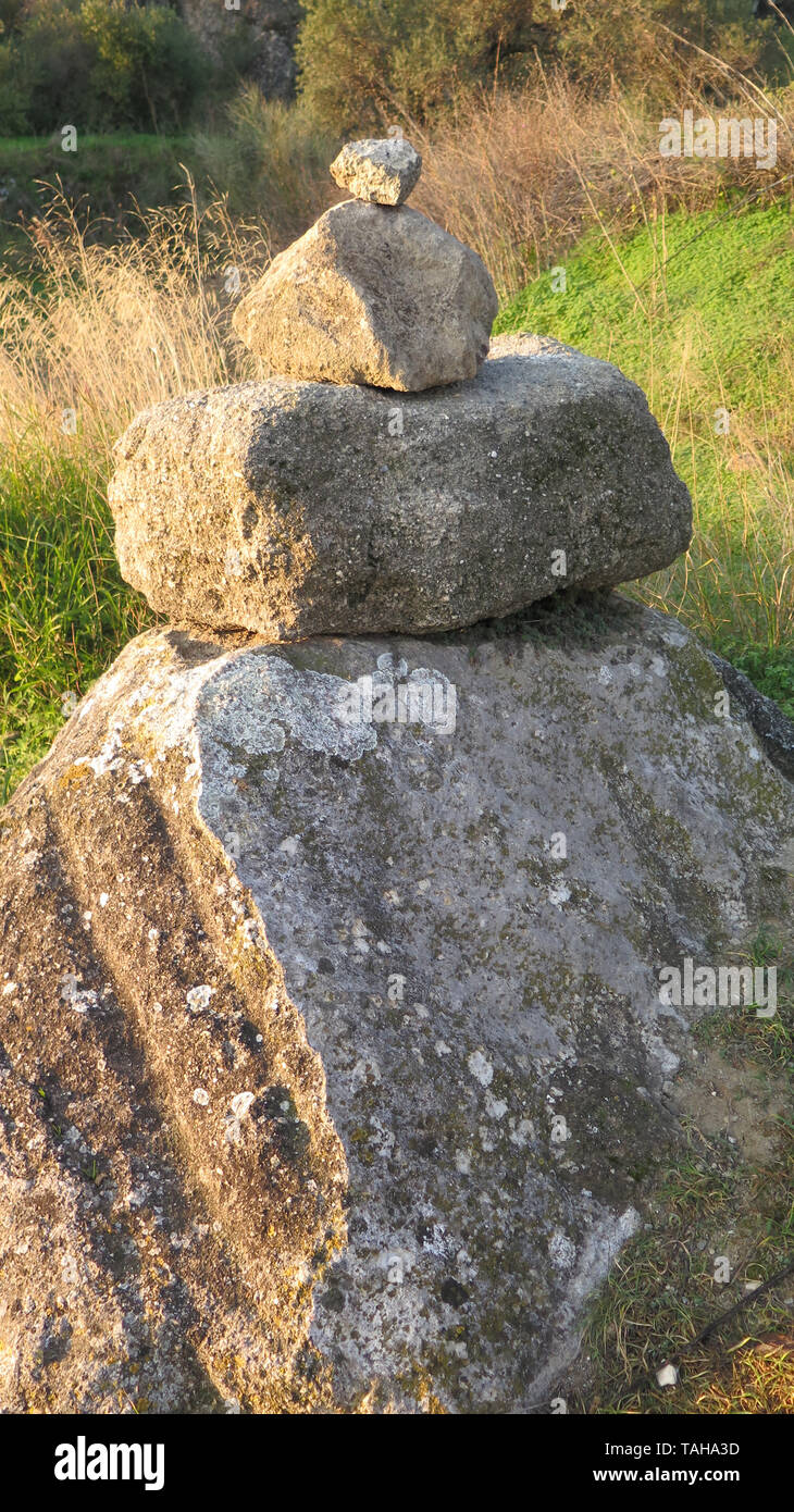 Rural balancing rock arrangement in Andalusian winter sun Stock Photo ...