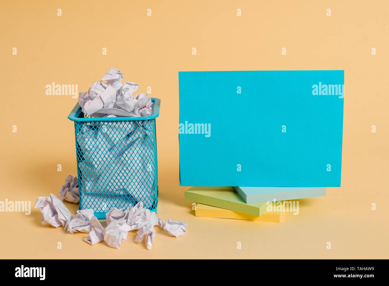 crumpled paper trash and stationary with empty paper placed in trash ...