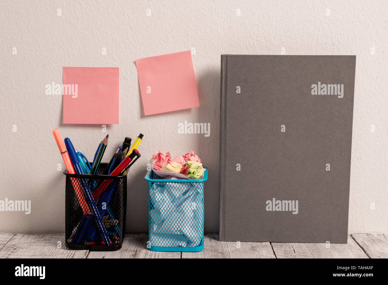 Stick Pad Notes on Wall Two Pencil Pots Hardcover Notebook on Work Desk ...