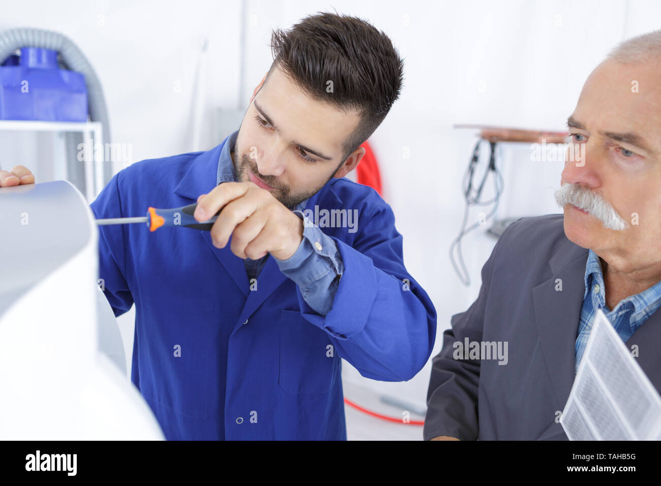 Man fixing damaged memory hi-res stock photography and images - Alamy
