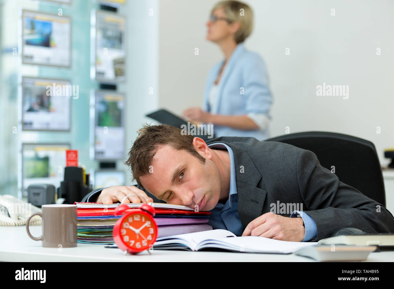 Slumped At Desk High Resolution Stock Photography and Images - Alamy
