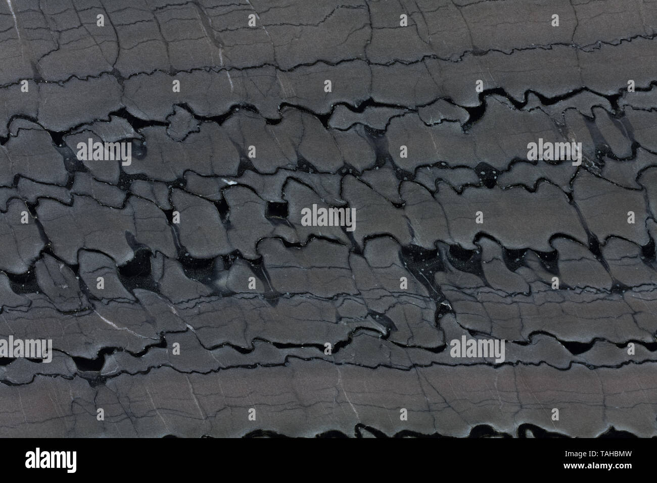 Close up of gray and black. quartzite stone texture. High resolution ...