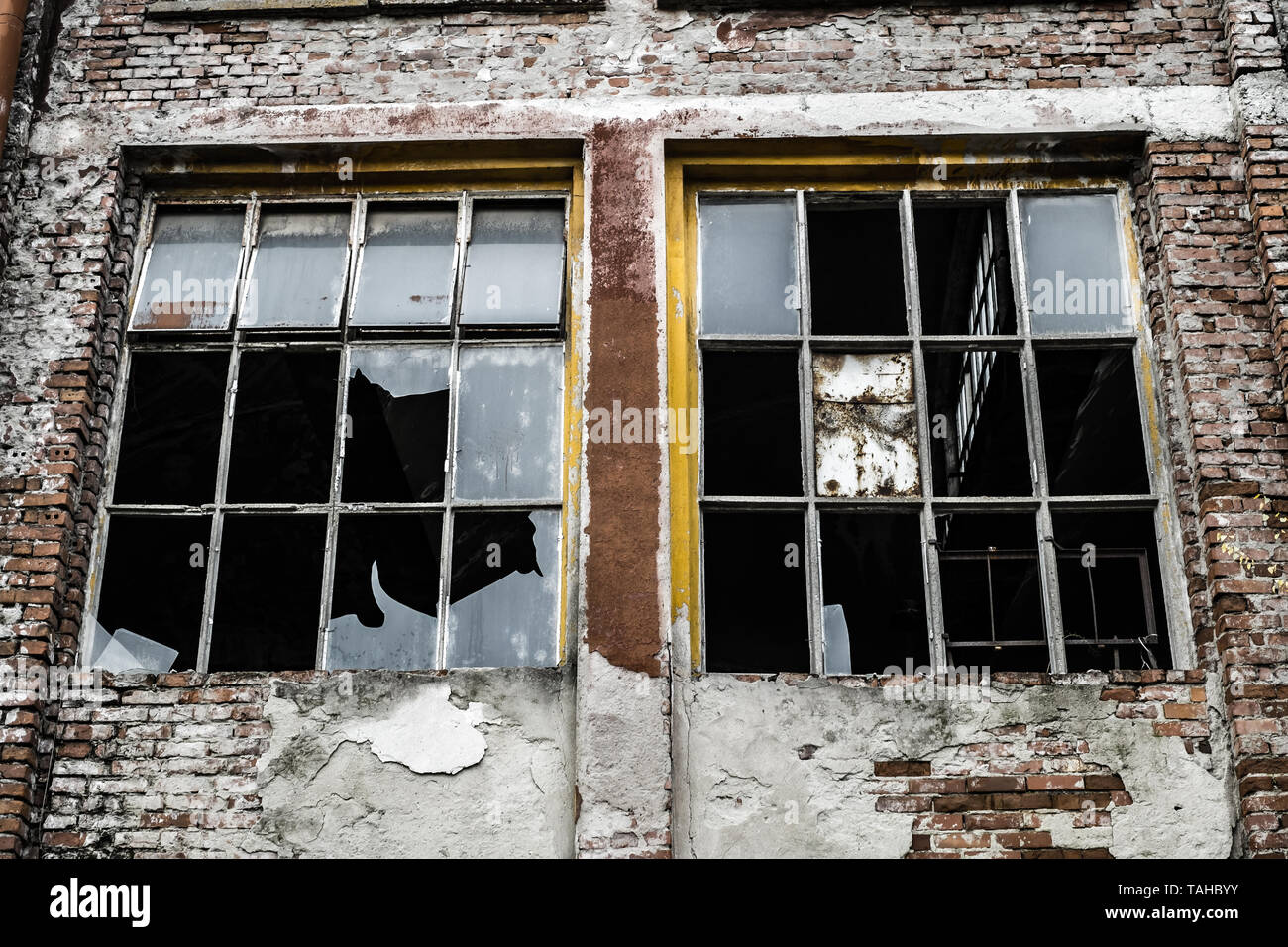 broken window of an industrial abandoned building Stock Photo - Alamy