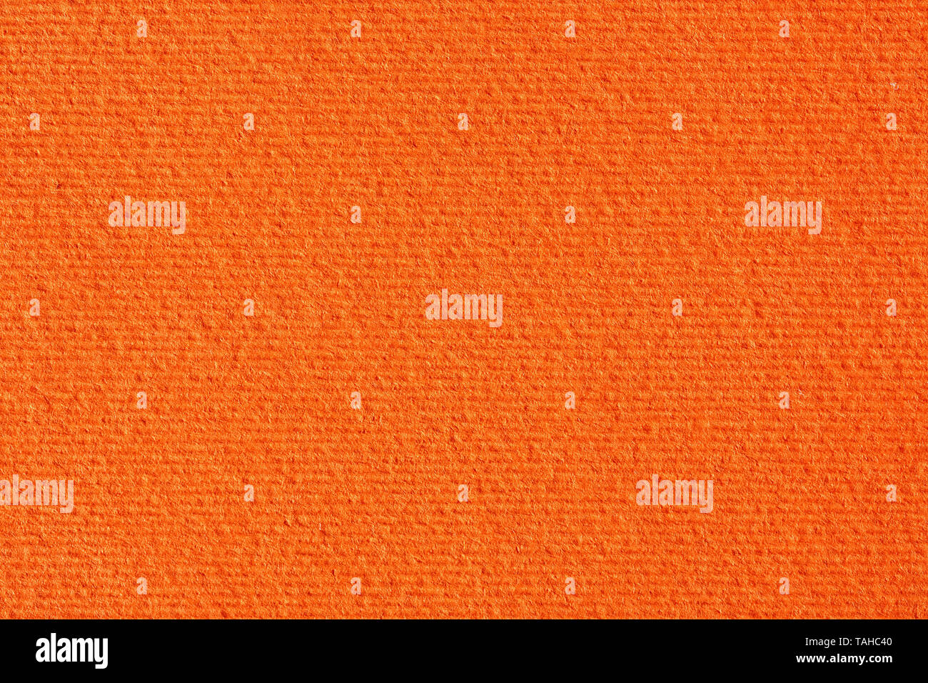 Vibrant lined orange paper texture for background. High resolution ...