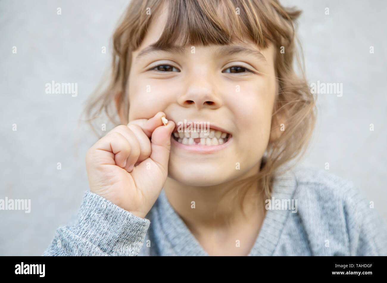 Pull out baby teeth hi-res stock photography and images - Alamy
