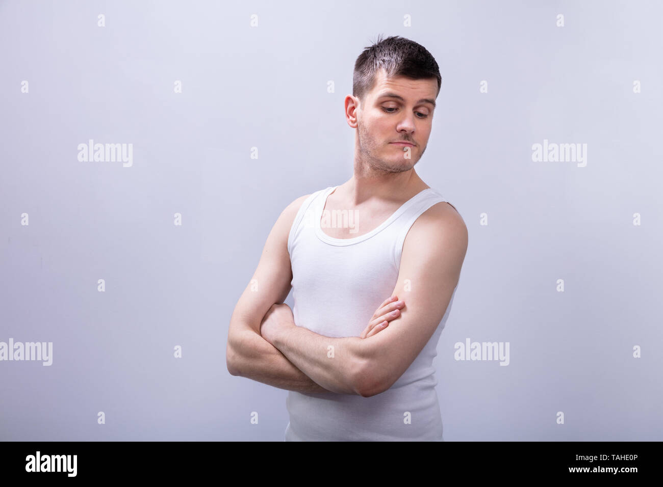 Male fitness model in white hi-res stock photography and images - Alamy