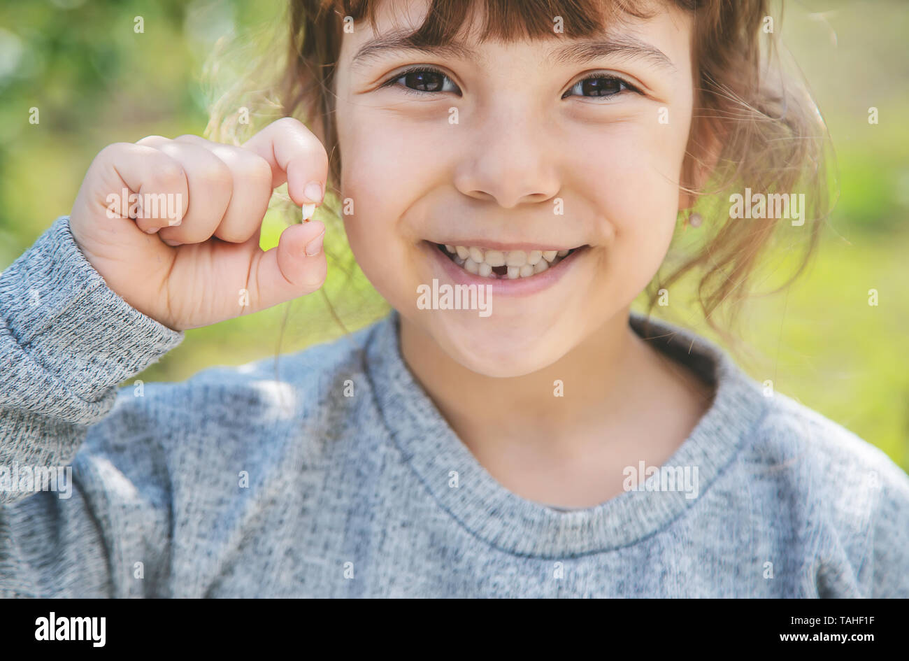 Pull out baby teeth hi-res stock photography and images - Alamy