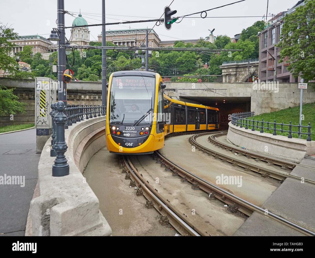 Budapest modern tram 19 along the Buda side of the Danube with Buda ...