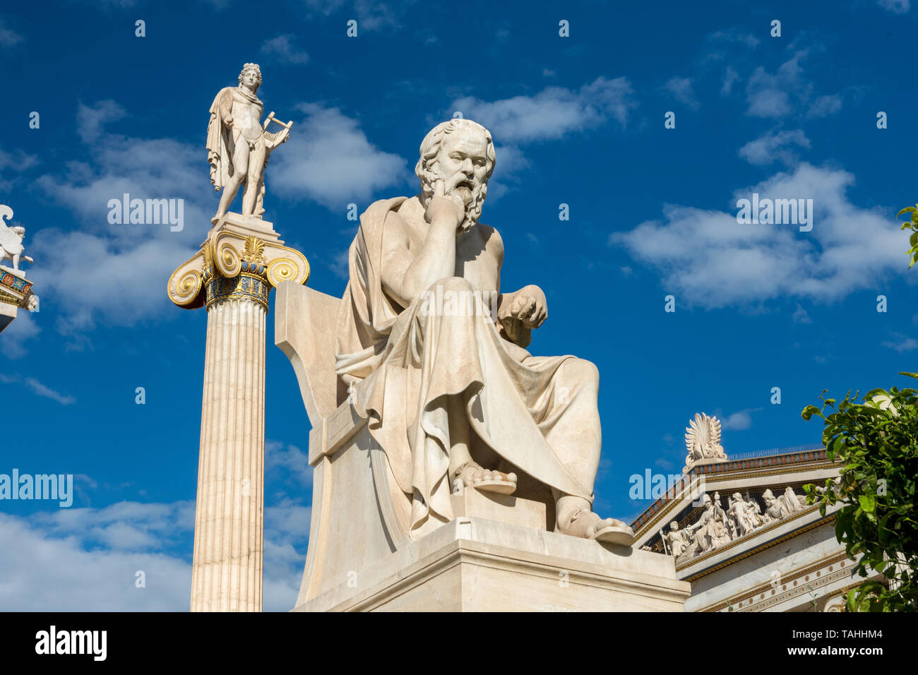 classical statue of Socrates from side with apollo statue above Stock ...