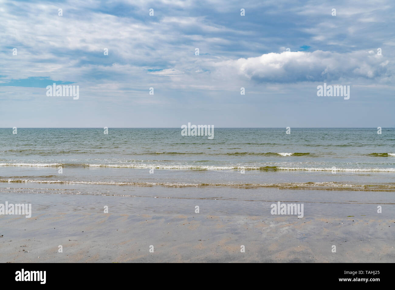 South Cornwall seascape with blue summer sky with clouds dotted ...