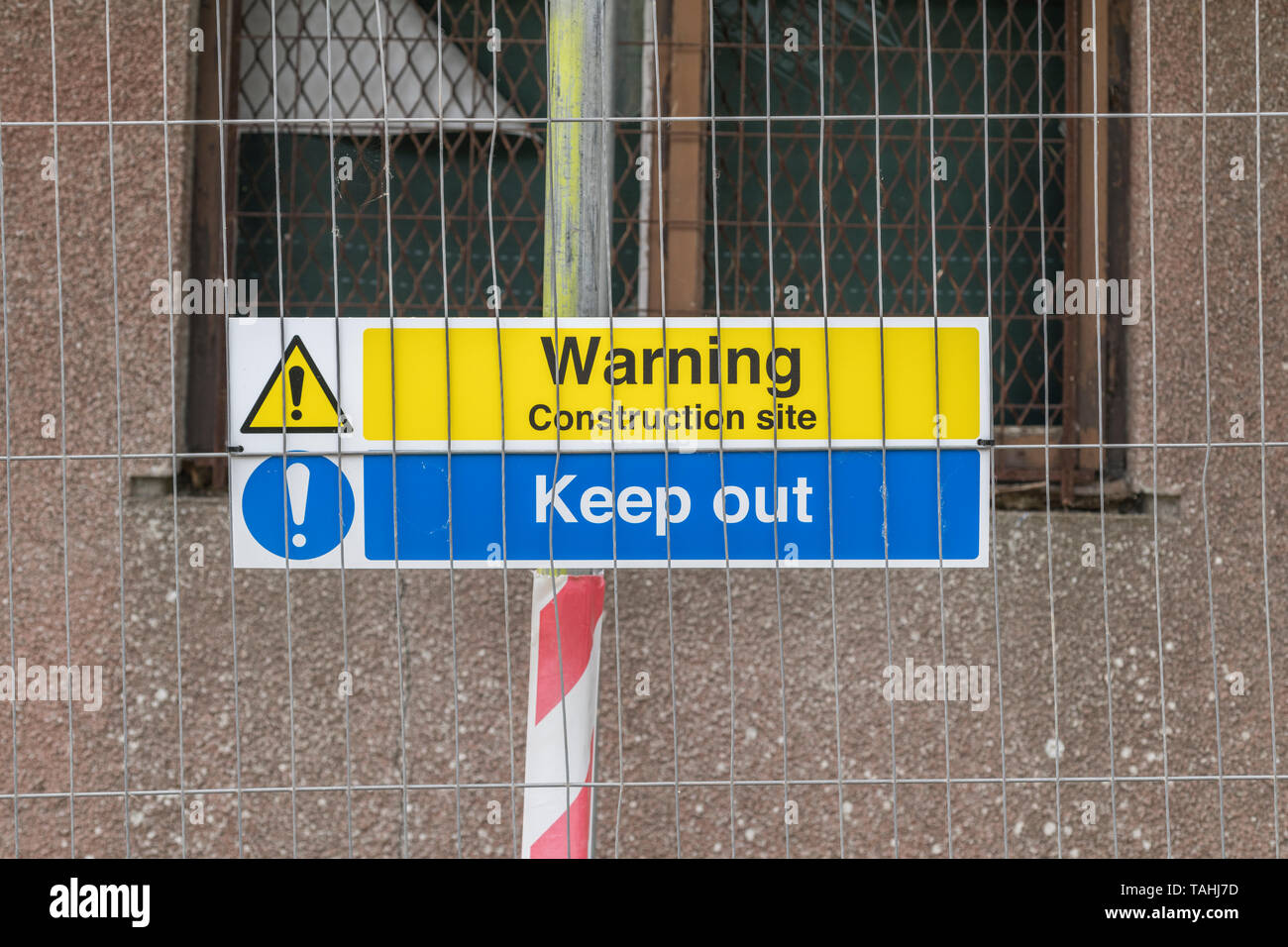 Health and Safety warning sign on building construction site fence ...