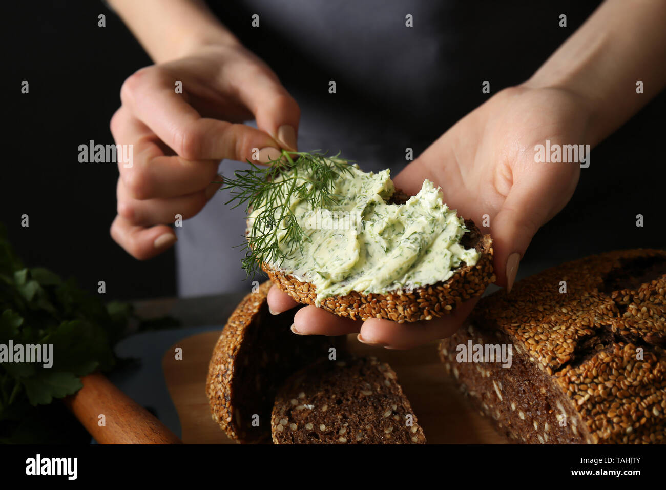 Woman eating slice bread butter hi-res stock photography and images - Alamy