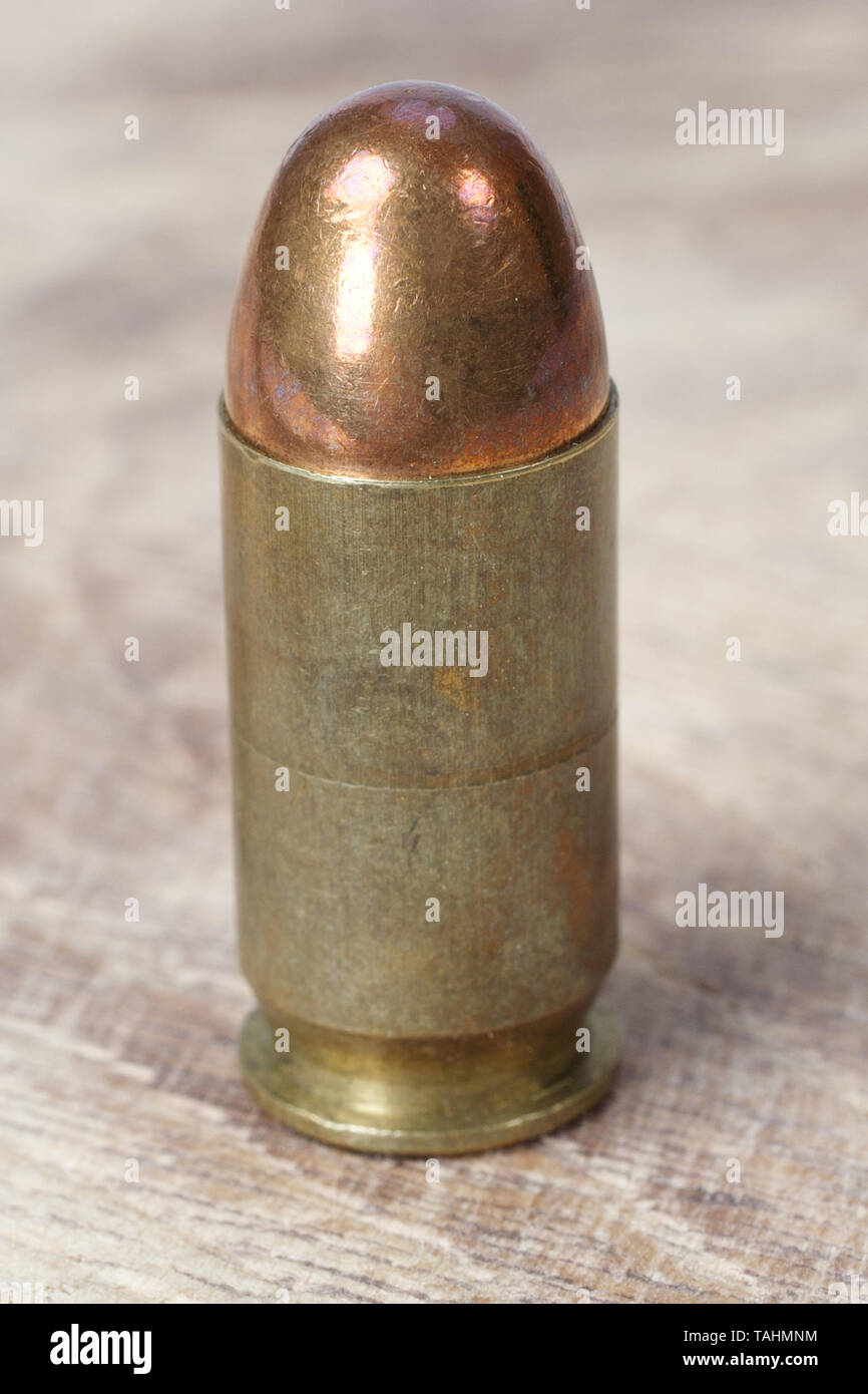 .45 ACP (Automatic Colt Pistol), or .45 Auto (11.43x23mm) a handgun ...