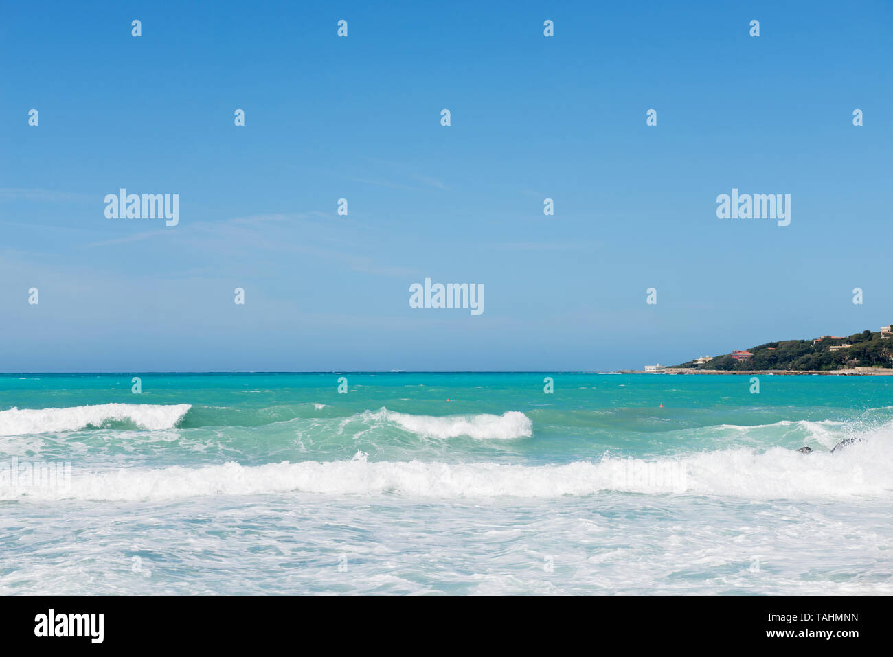 Beautiful azure sea and waves Stock Photo - Alamy