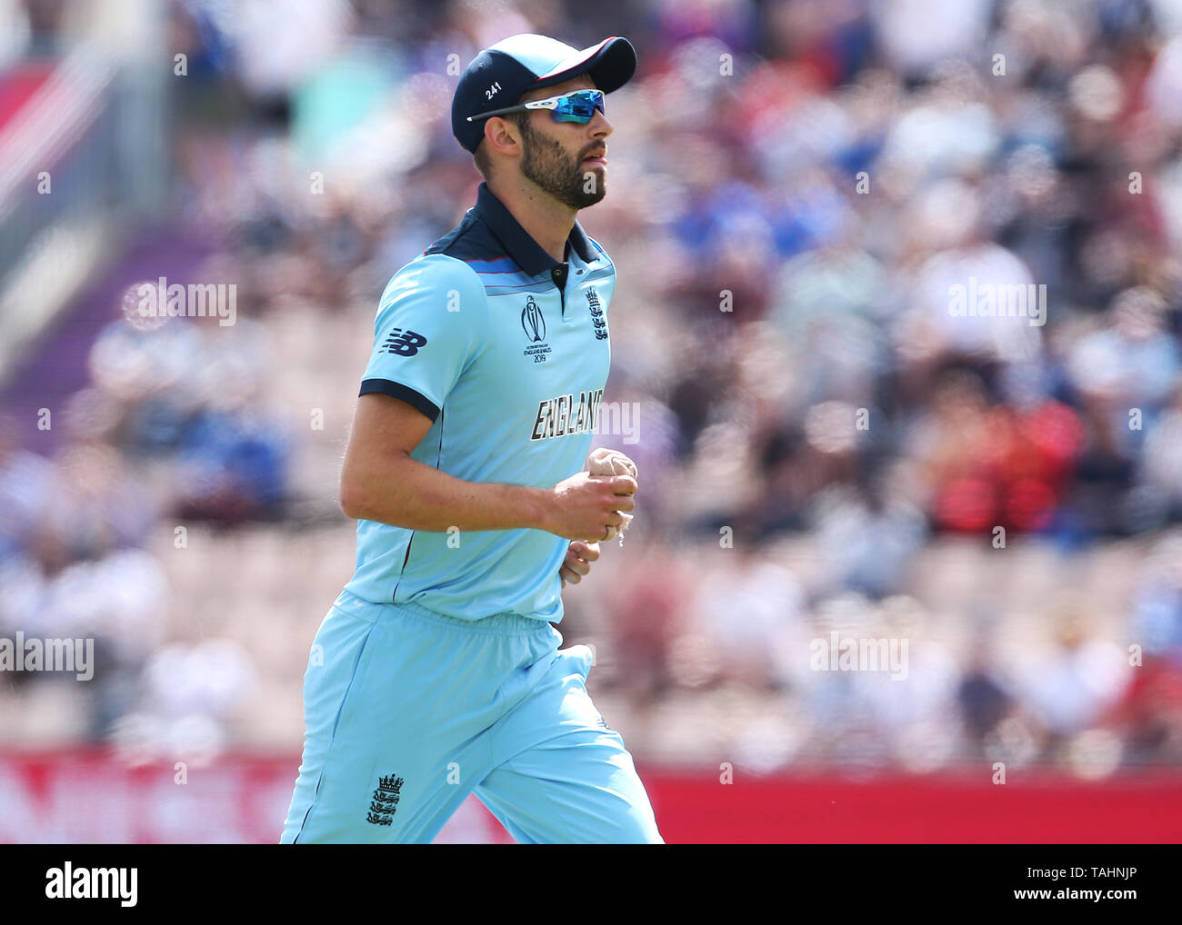 England's Mark Wood leaves the pitch during the ICC Cricket World Cup ...