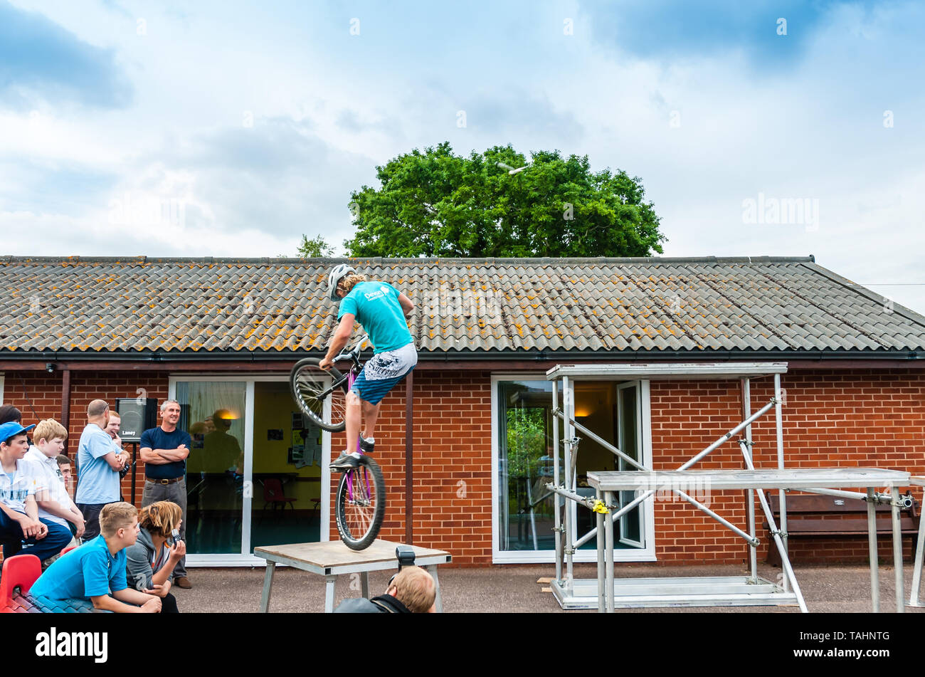 Leaping on a table! Looks quite dangerous Stock Photo - Alamy