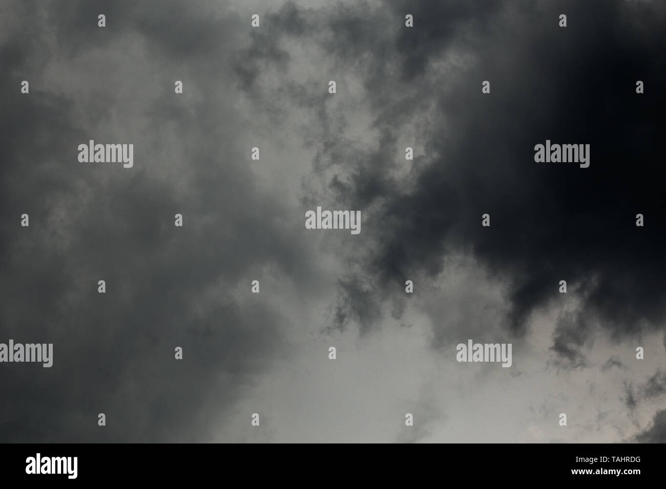 gray incoming storm clouds dark closeup backdrop, captured on 100 mm ...