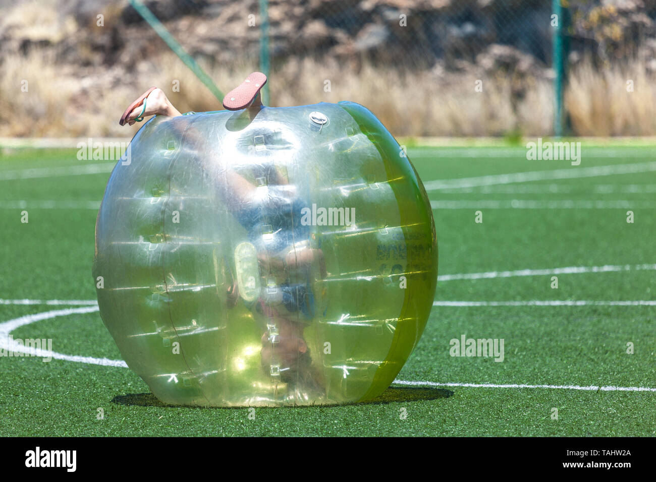 children playing with soccer bubbles Stock Photo - Alamy