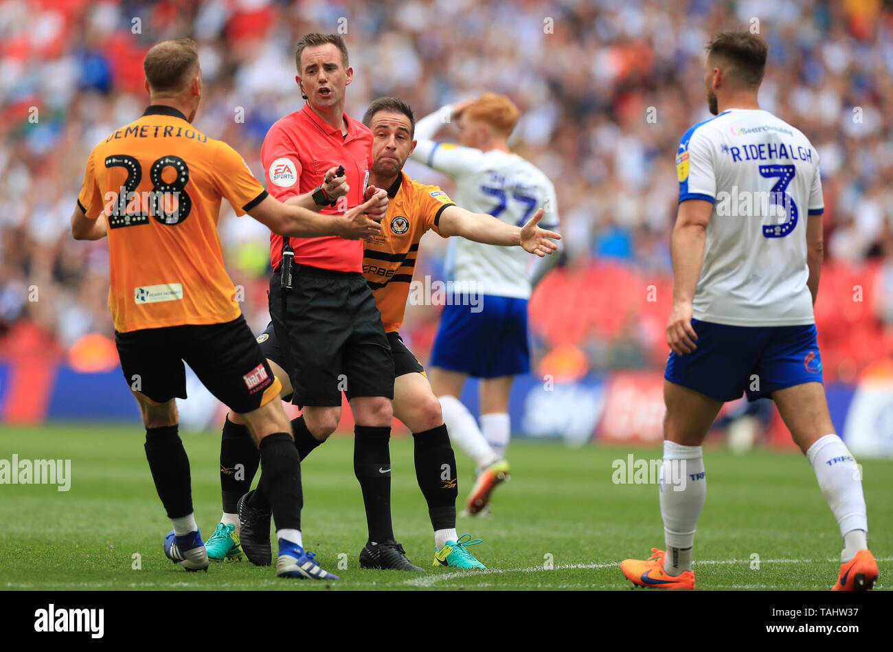 Newport County's Mickey Demetriou appeals to match referee Ross Joyce ...