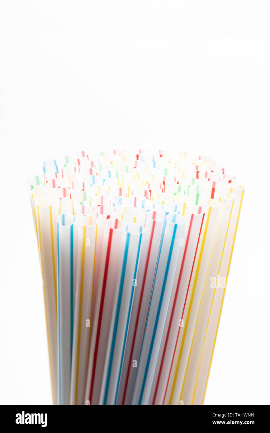 A close-up shot with selective focus of a bunch of unused colored bendy ...