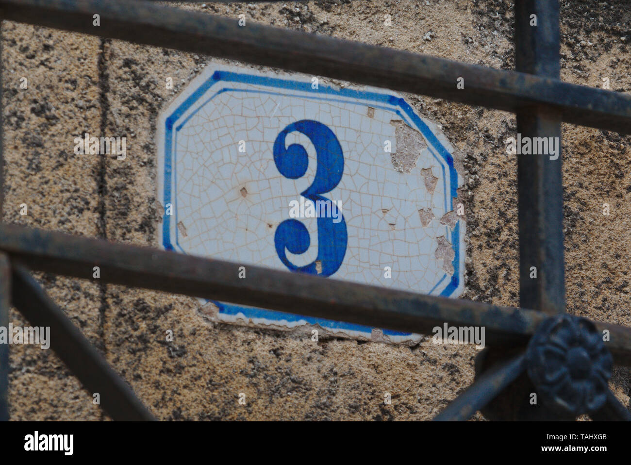 Ceramic tile with number three Stock Photo - Alamy