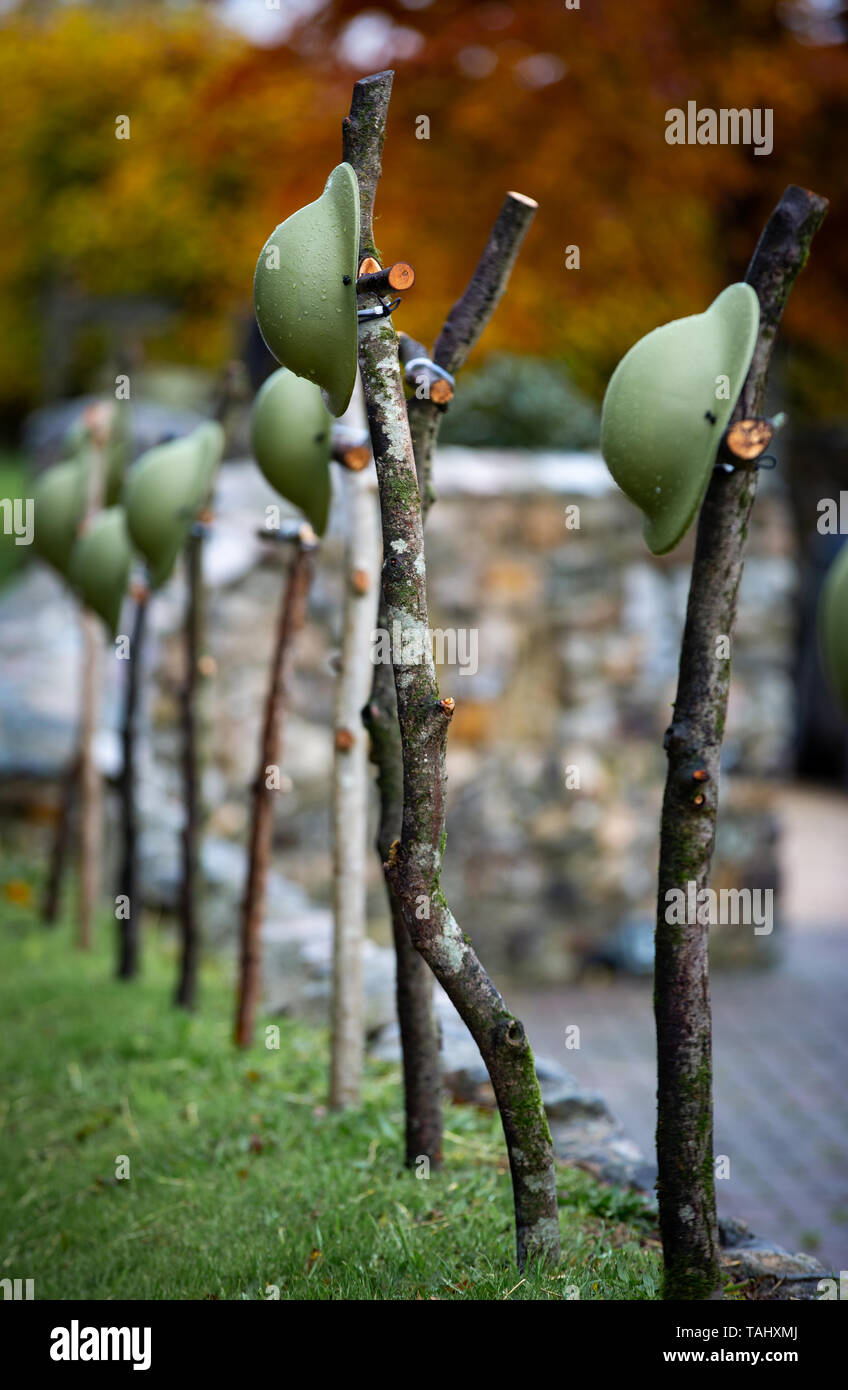 Display of helmets on makeshift crosses for the centenery of armistice ...