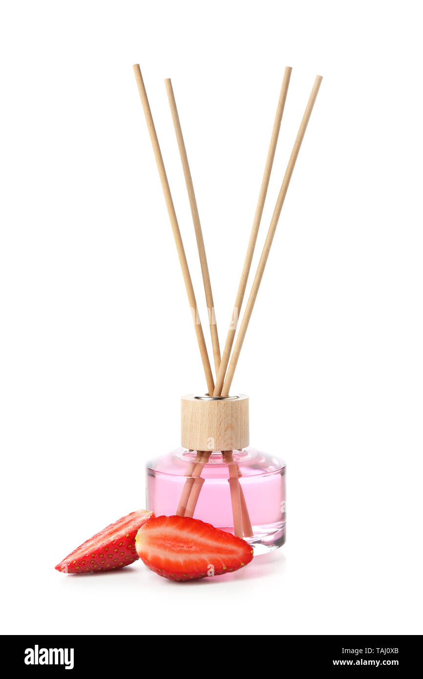 Reed diffuser and strawberry on white background Stock Photo - Alamy
