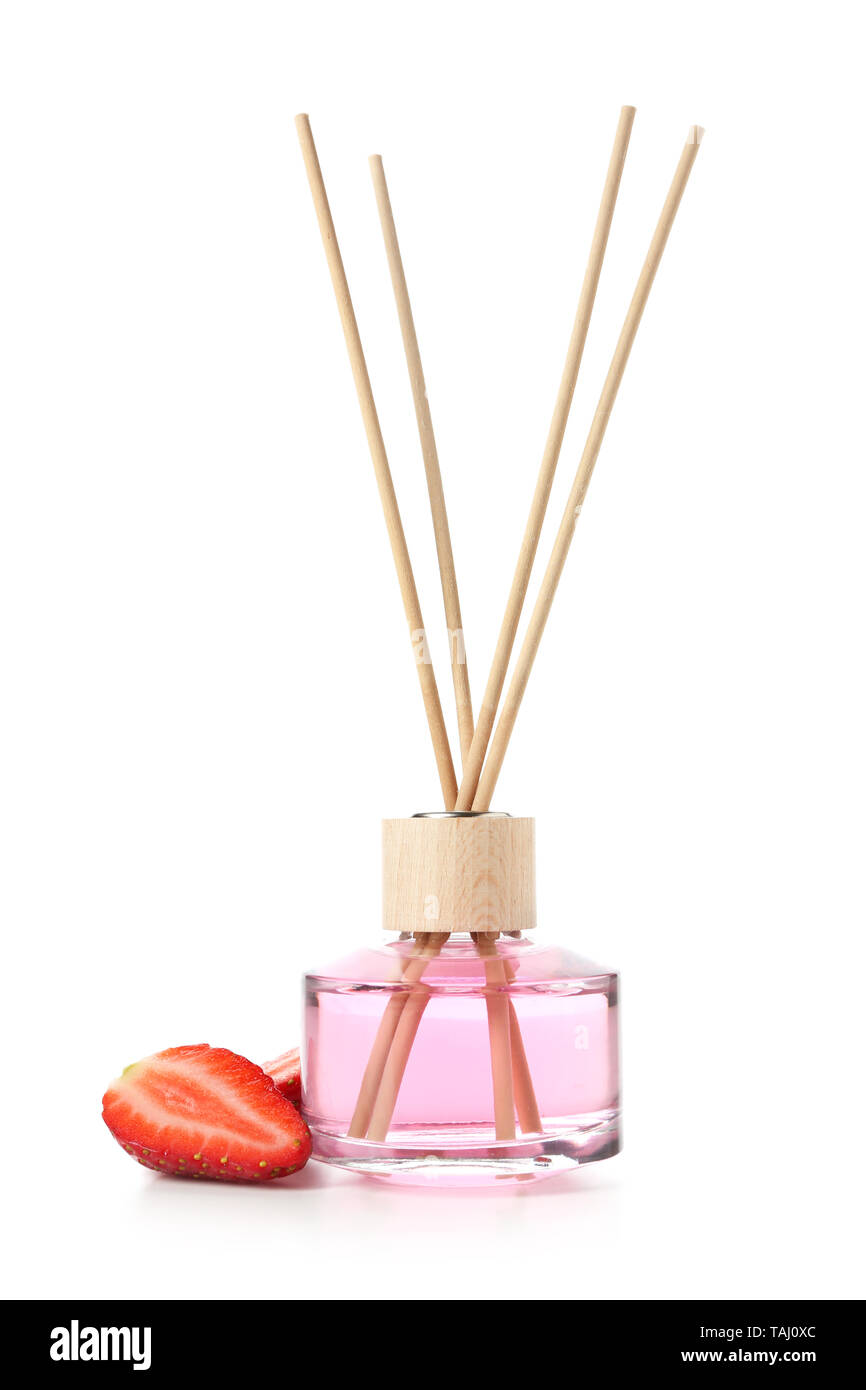 Reed diffuser and strawberry on white background Stock Photo - Alamy