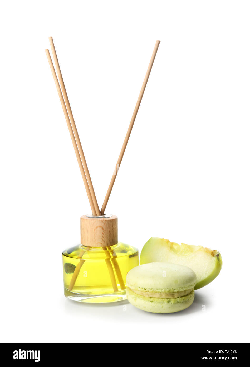 Reed diffuser, apple and cake on white background Stock Photo - Alamy