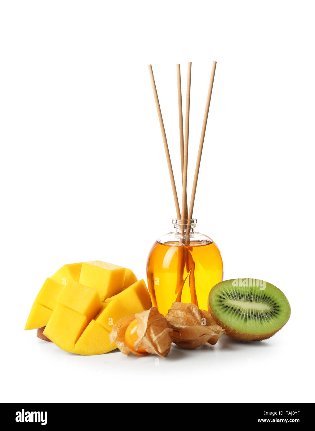 Fruit reed diffuser on white background Stock Photo - Alamy
