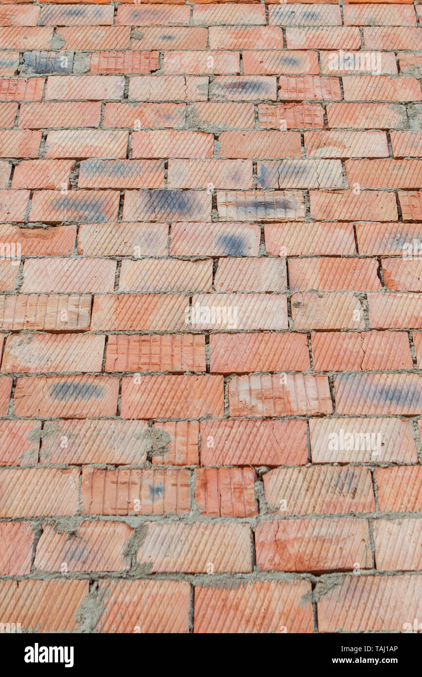 Red brick wall inscriptions hi-res stock photography and images - Alamy