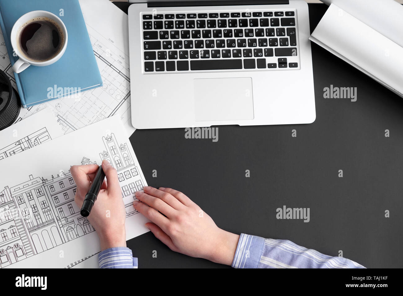 Female engineer working on dark background Stock Photo - Alamy